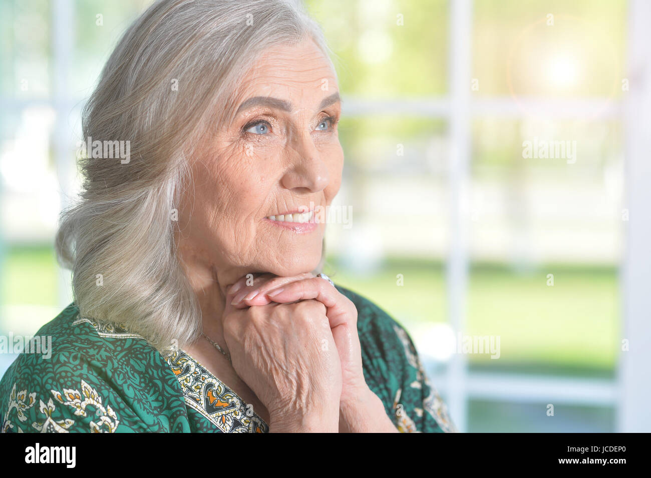 Senior woman indoors hi-res stock photography and images - Alamy