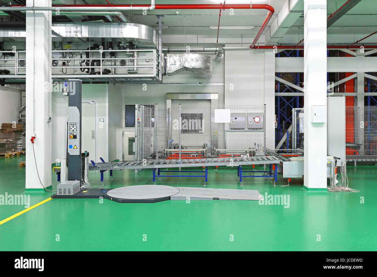 Coveyor belt and stretch wrapping machine in distribution warehouse ...