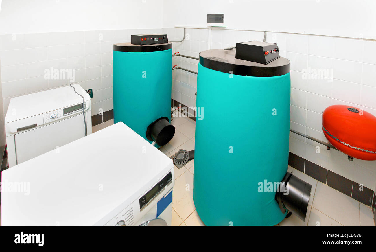 Boiler room inside private house interior with pipeline system Stock ...