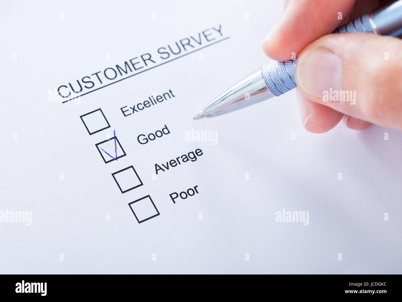 Close-up Of Human Hand Filling Customer Survey Form Stock Photo - Alamy