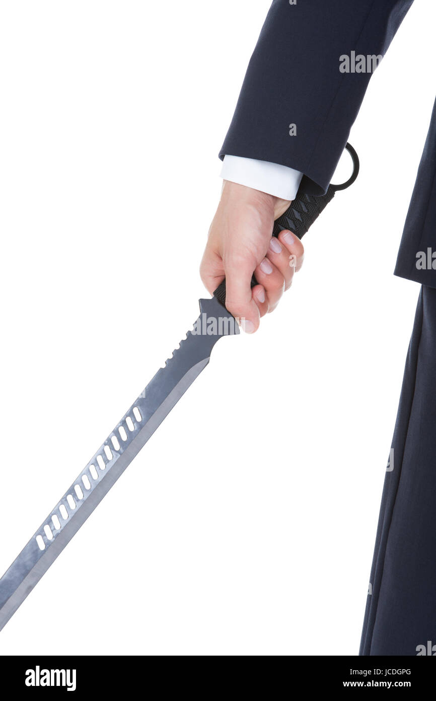 Young Businessman Standing With Sword Over White Background Stock Photo ...