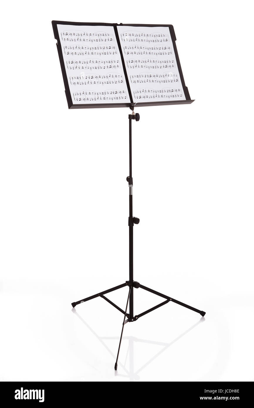 Musical Notes On Stand Over White Background Stock Photo - Alamy