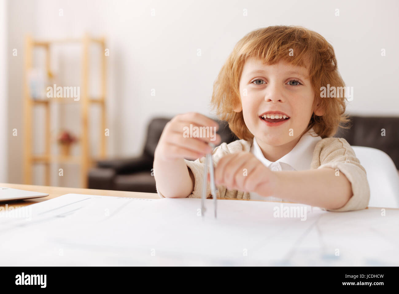 Smiling little male person posing on camera Stock Photo - Alamy