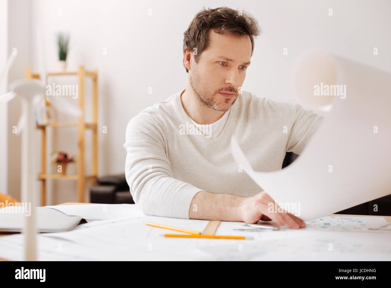 Construction engineer checking drawing hi-res stock photography and ...