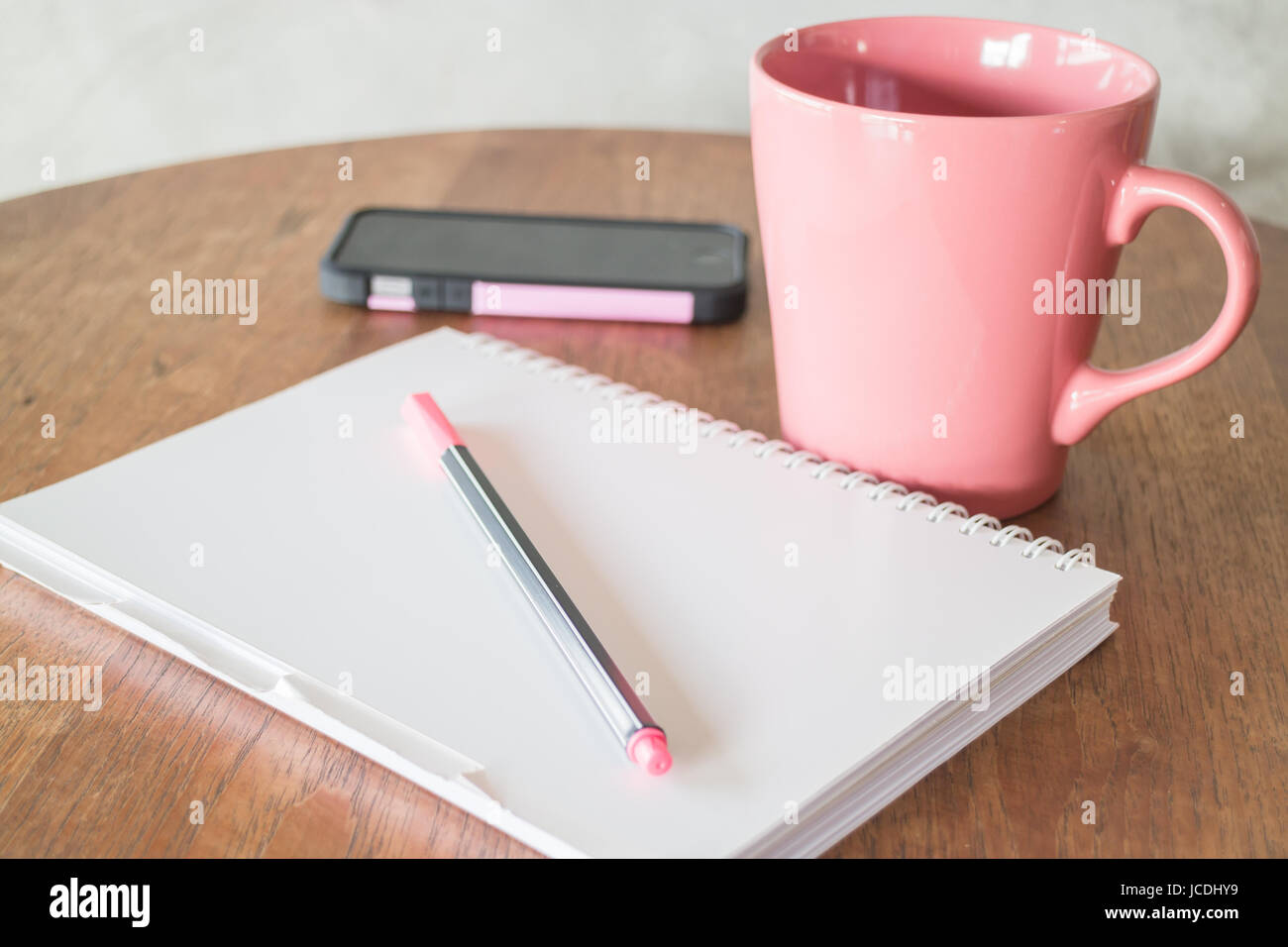 Creative work table in coffee shop, stock photo Stock Photo - Alamy
