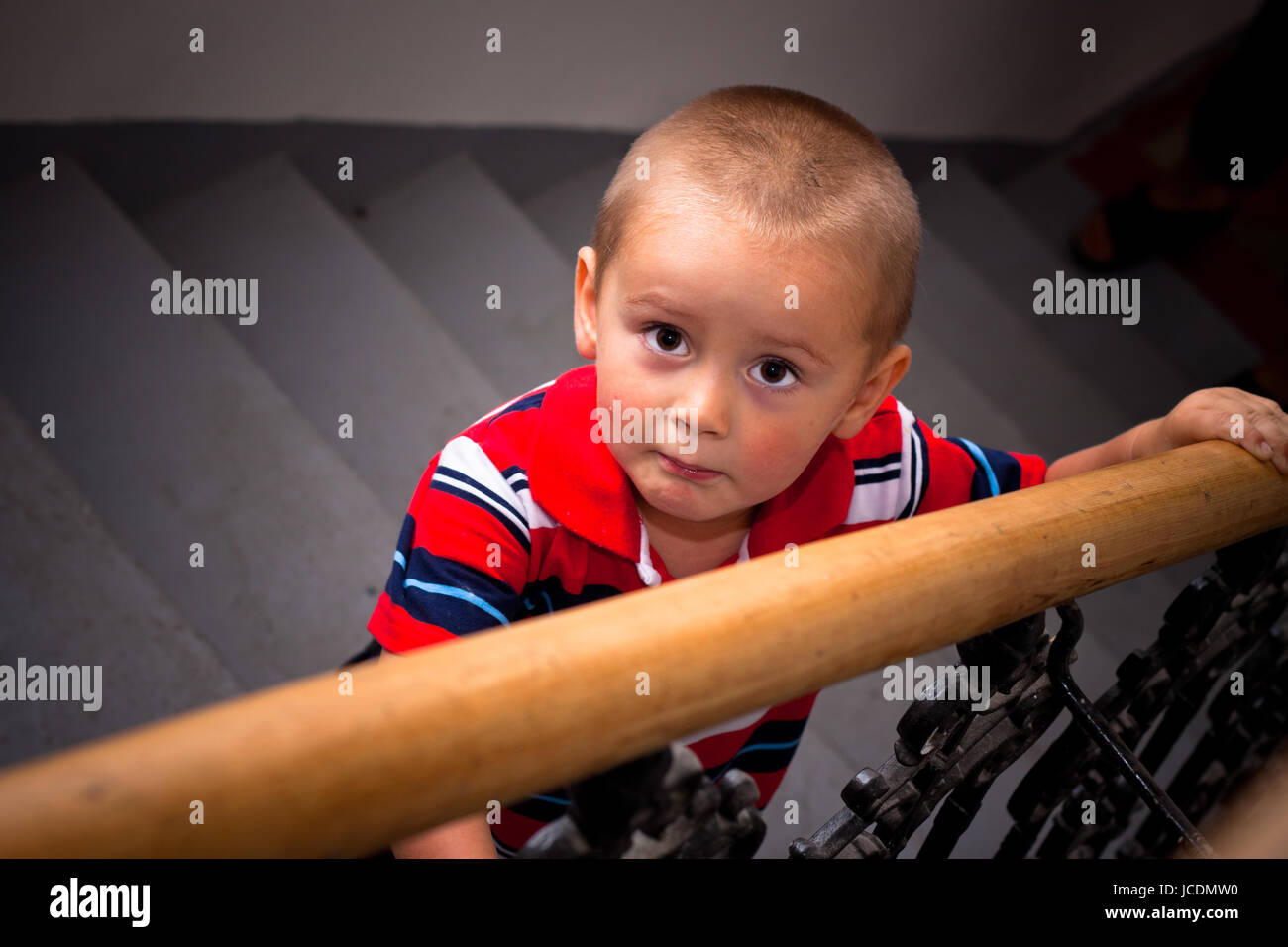 Sad toddler on step hi-res stock photography and images - Alamy