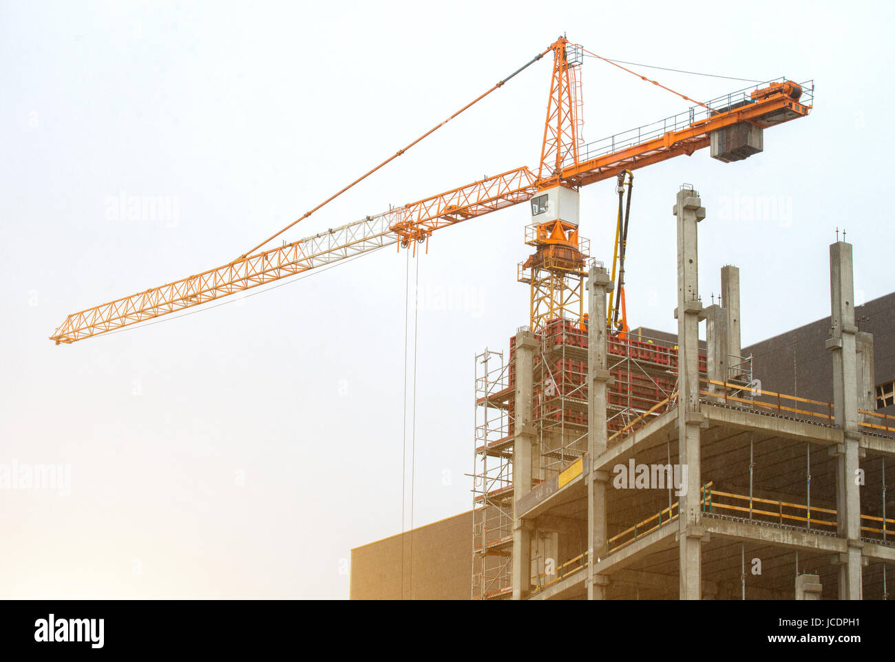Industrial construction crane in the city Stock Photo - Alamy