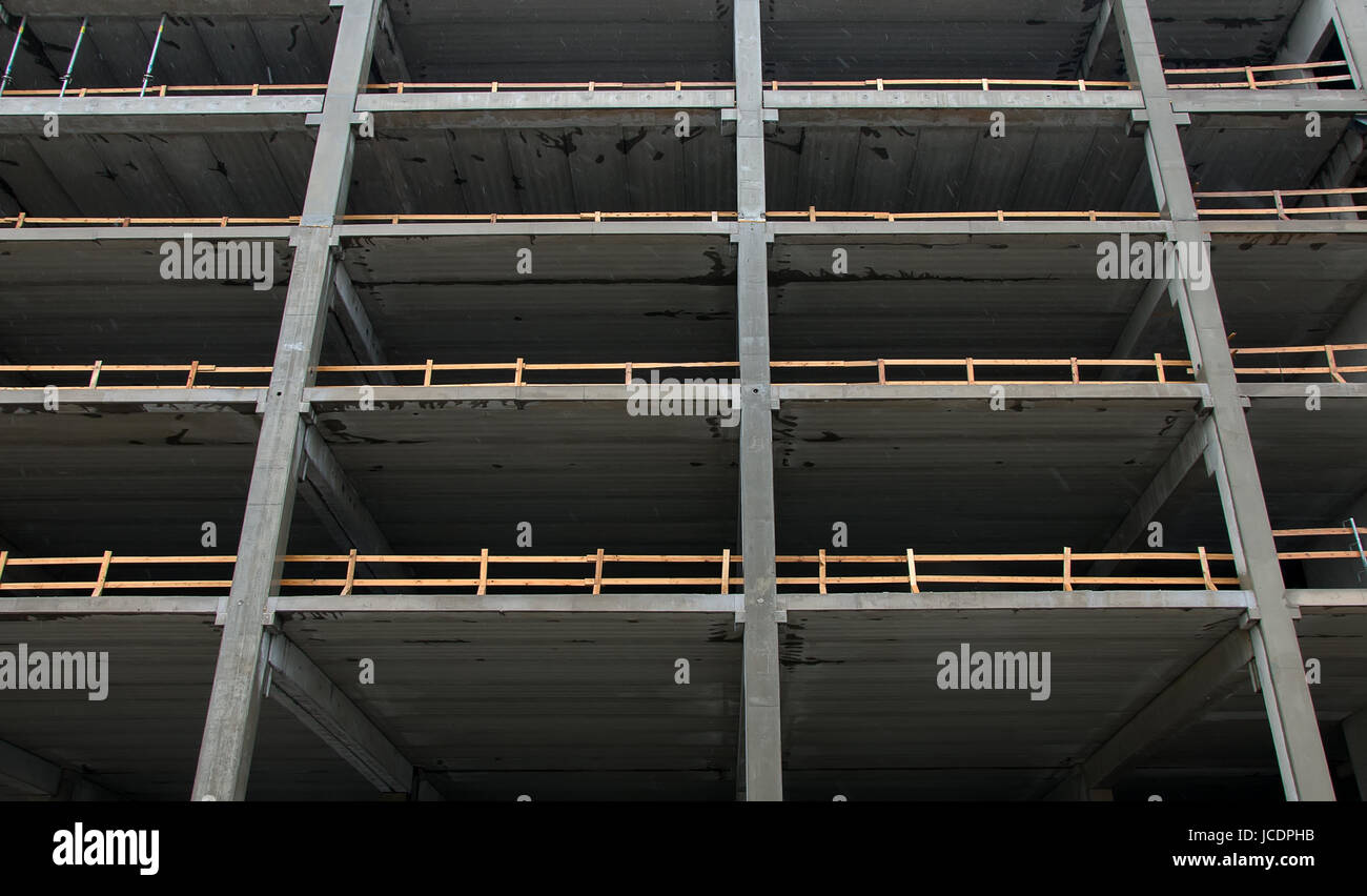 Large construction site with scaffolding building Stock Photo - Alamy