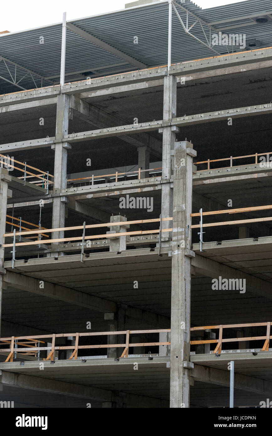 Large construction site with scaffolding building Stock Photo - Alamy