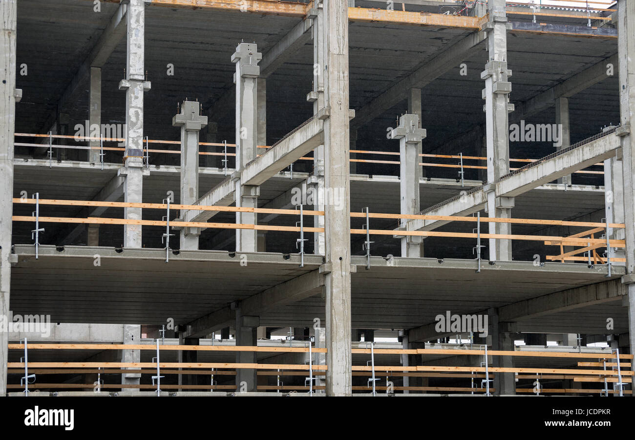Large construction site with scaffolding building Stock Photo - Alamy