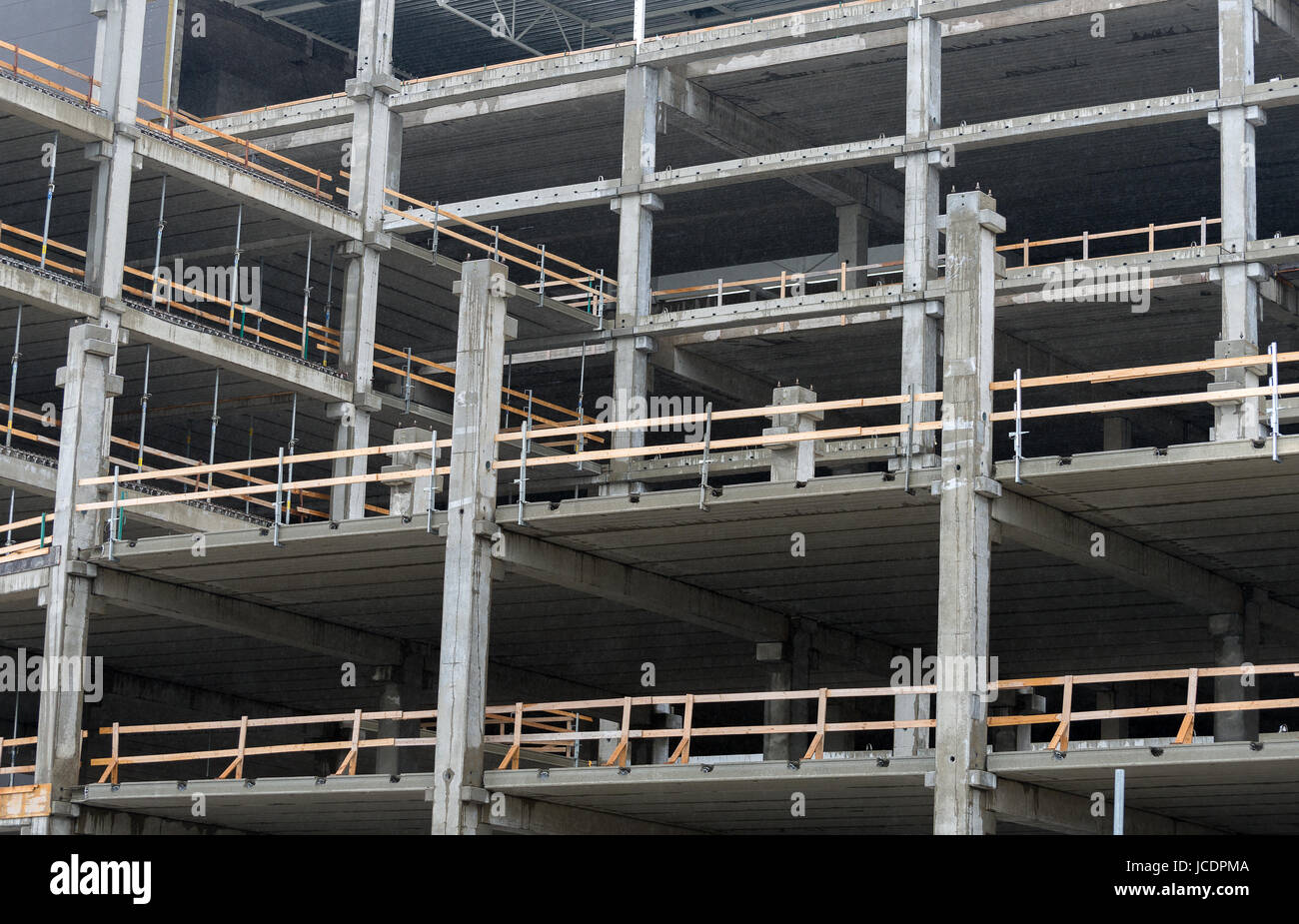 Large construction site with scaffolding building Stock Photo - Alamy