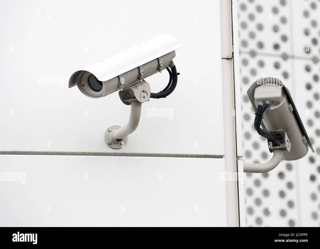 Close-up view of surveillance cameras on the street Stock Photo - Alamy