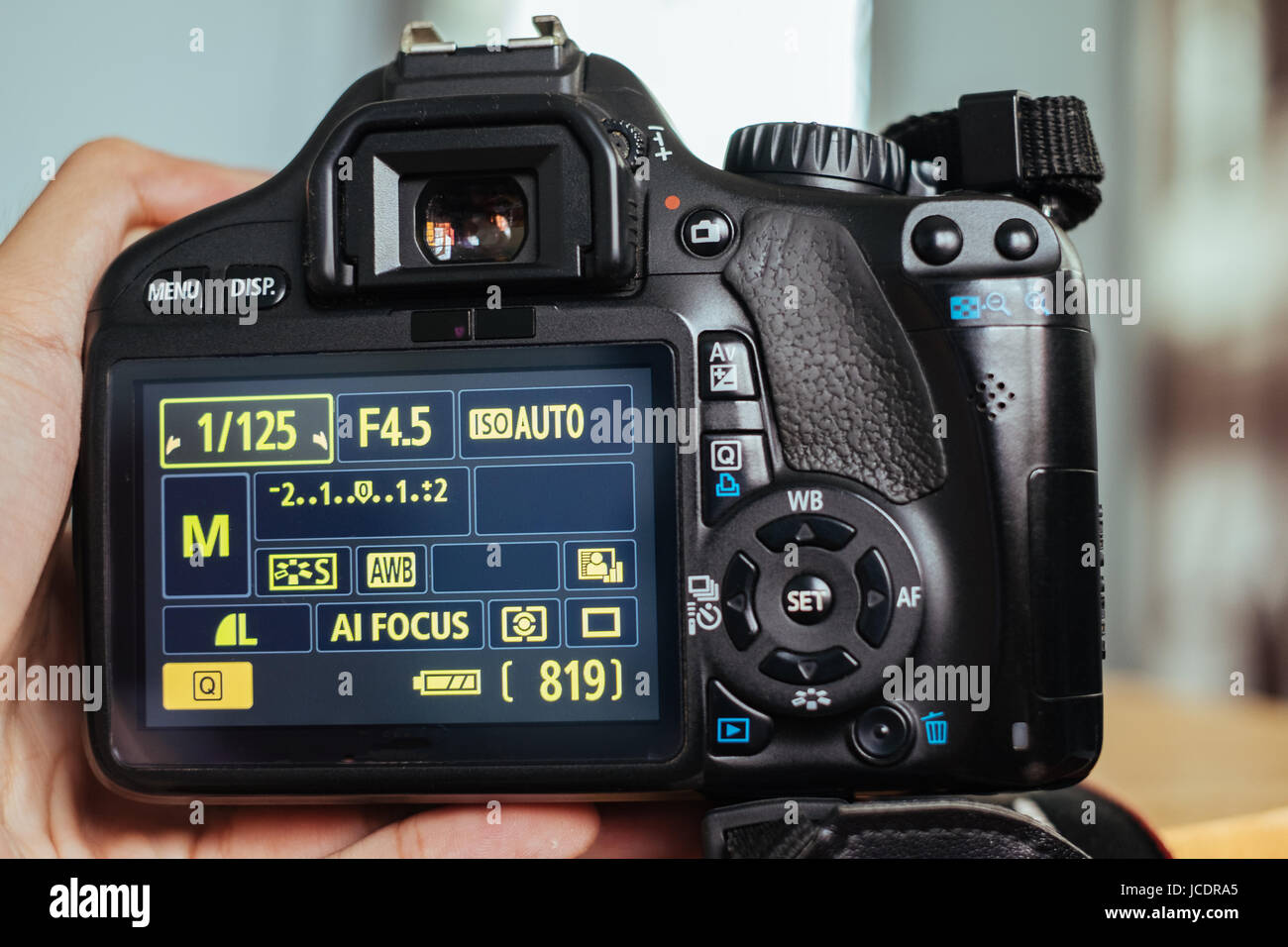 DSLR camera on human hands Stock Photo - Alamy