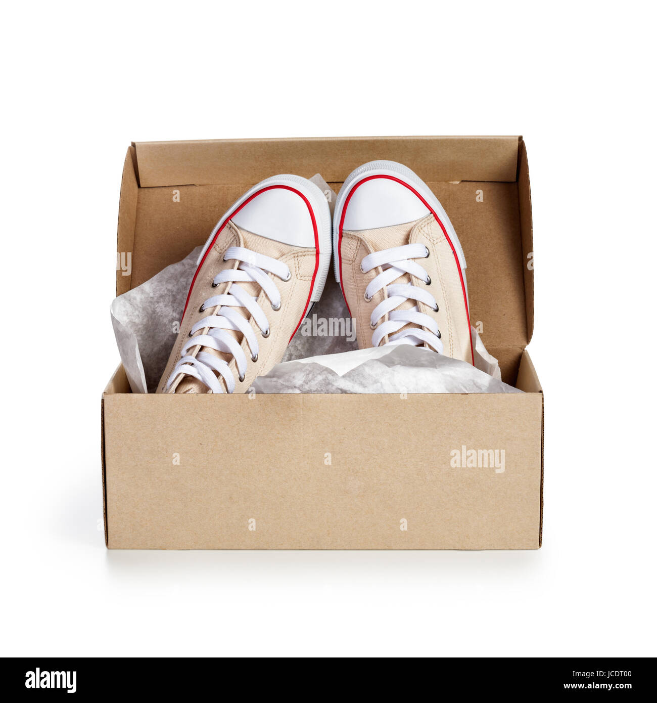 Shoe box with pair of new sneakers isolated on white background. Object ...