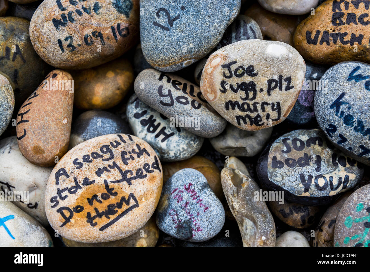 Pebbles with messages hi-res stock photography and images - Alamy