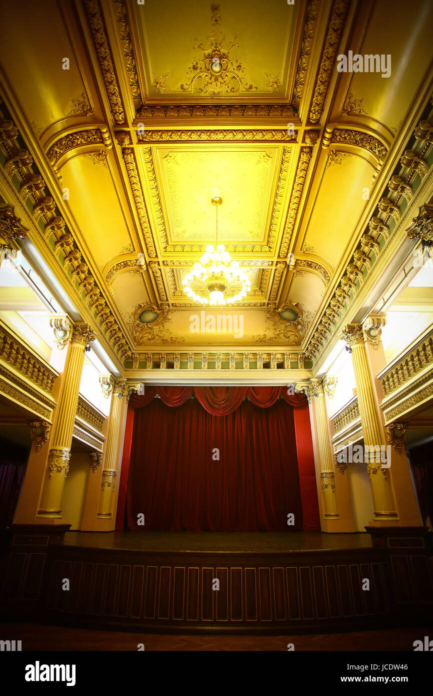 Color image of an old theater room with stage and a curtain Stock Photo ...