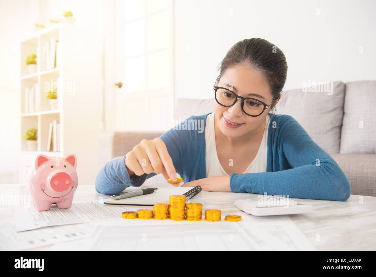happy asian girl student woman counting money tower from savings of ...