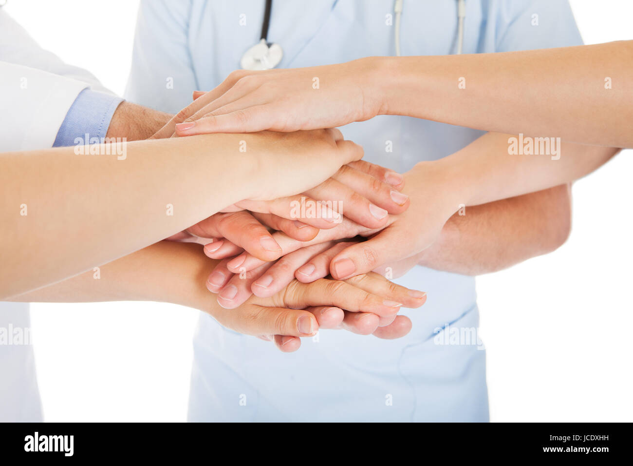 Close-up Photo Of Doctors Stacking Hand With Coworkers Stock Photo - Alamy