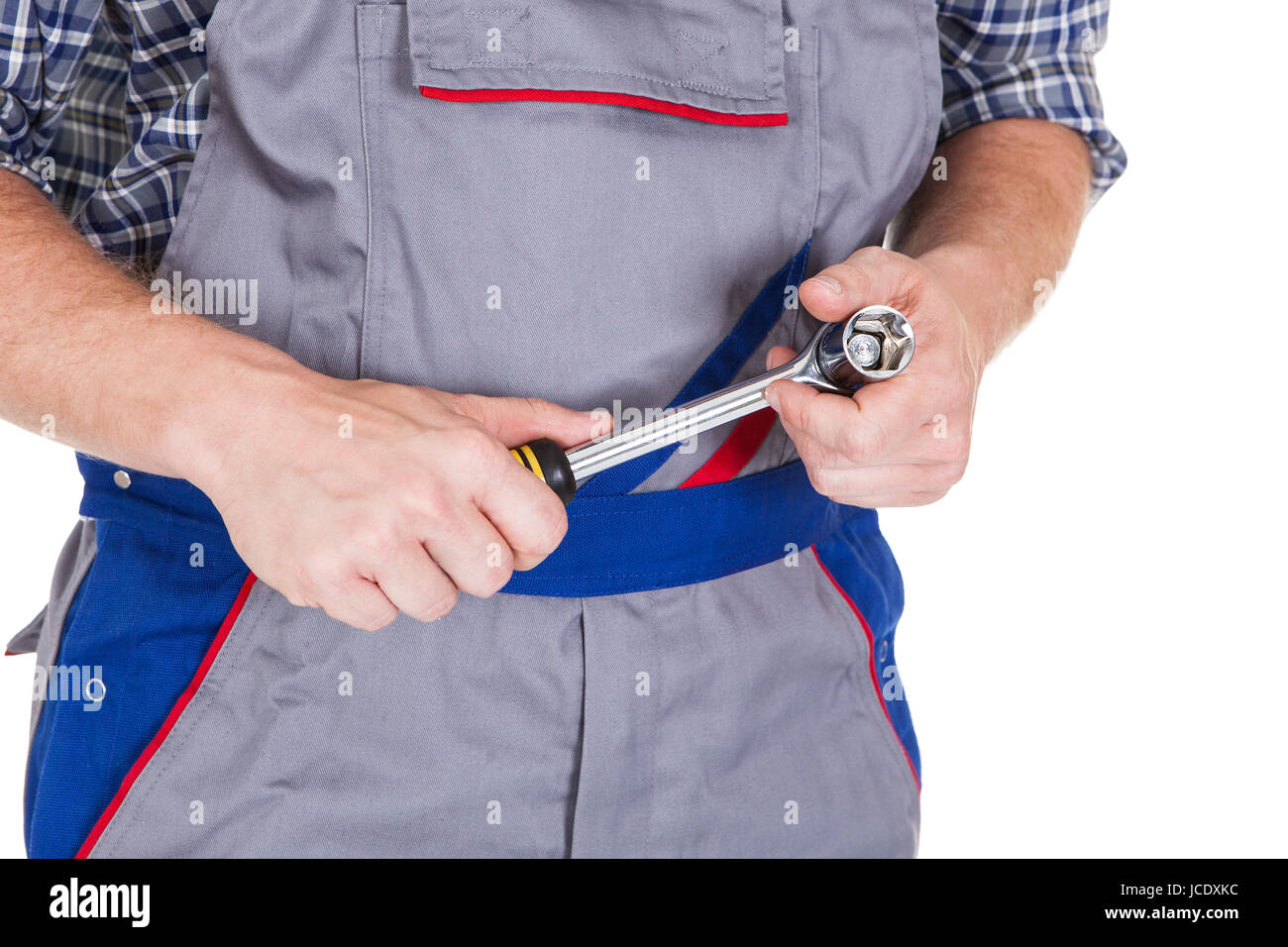 Male mechanic holding ratchet isolated on white background Stock Photo ...