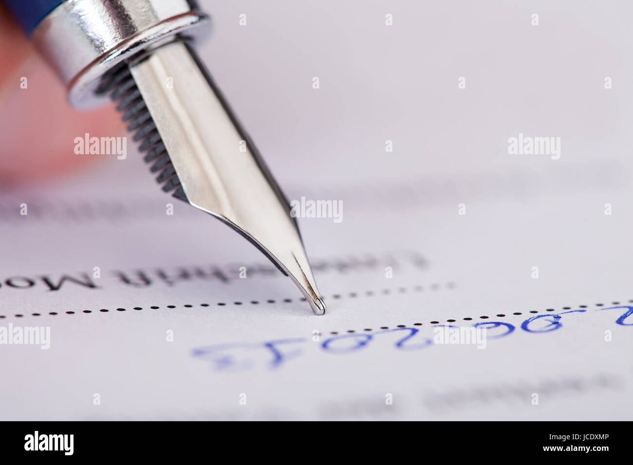 Close-up Of Businessman Hand Writing With Ink Pen Over Document Stock ...