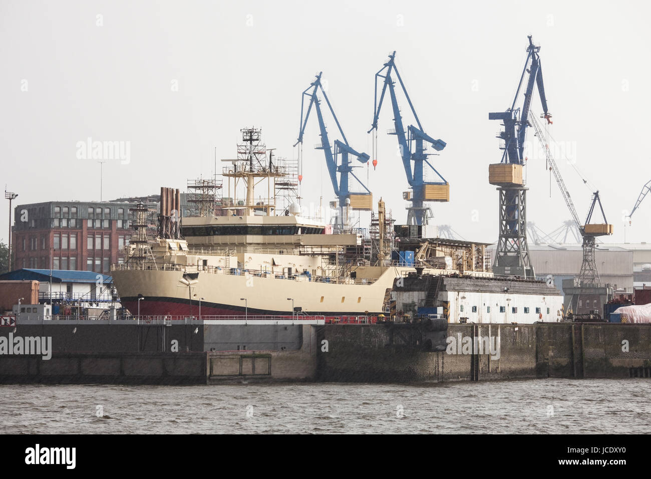Huge ship in docks at Hamburg Harbor, Germany Stock Photo - Alamy