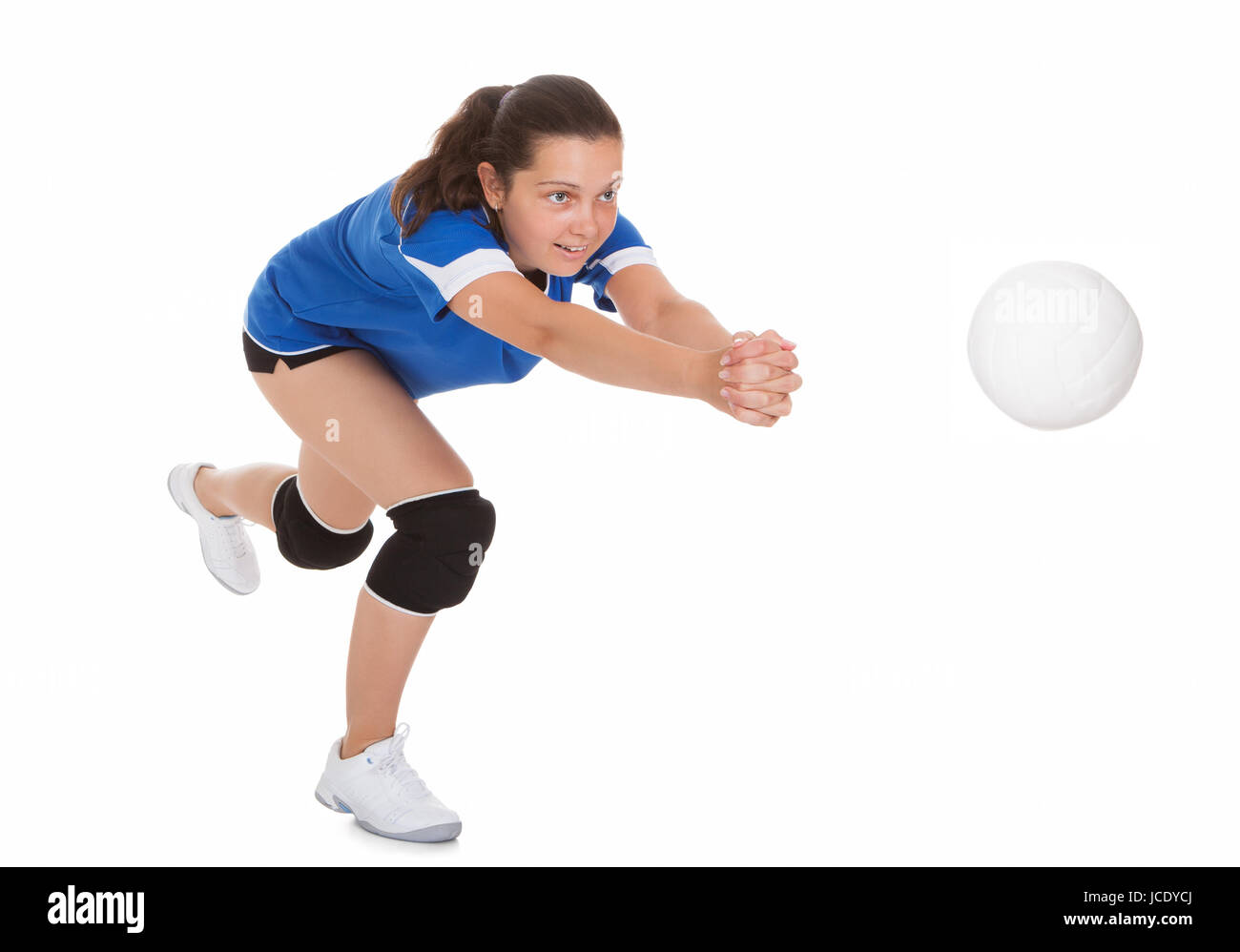 Portrait of female volleyball player isolated on white background Stock ...