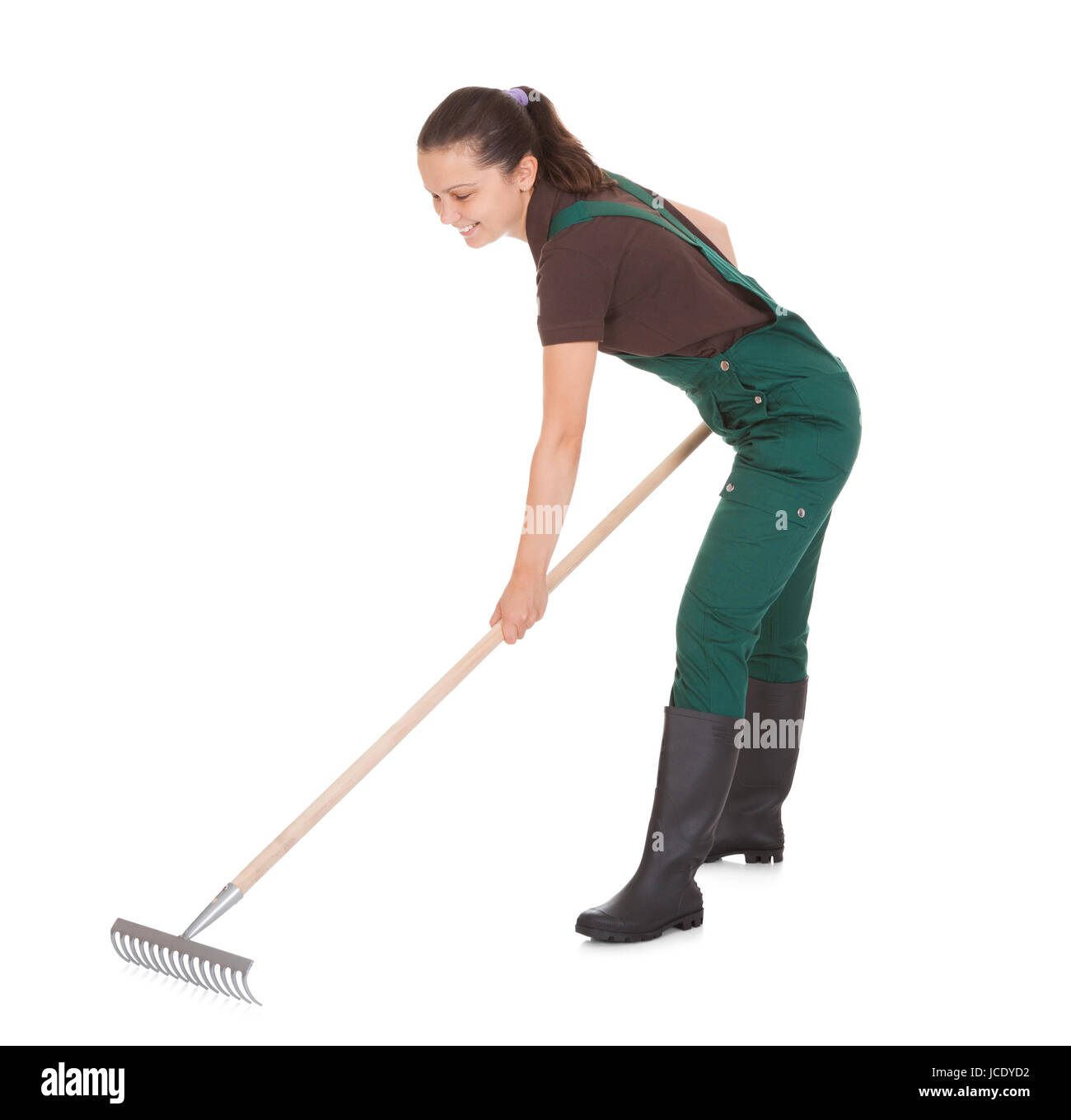 Young Female Gardner With Gardening Tools on white background Stock ...