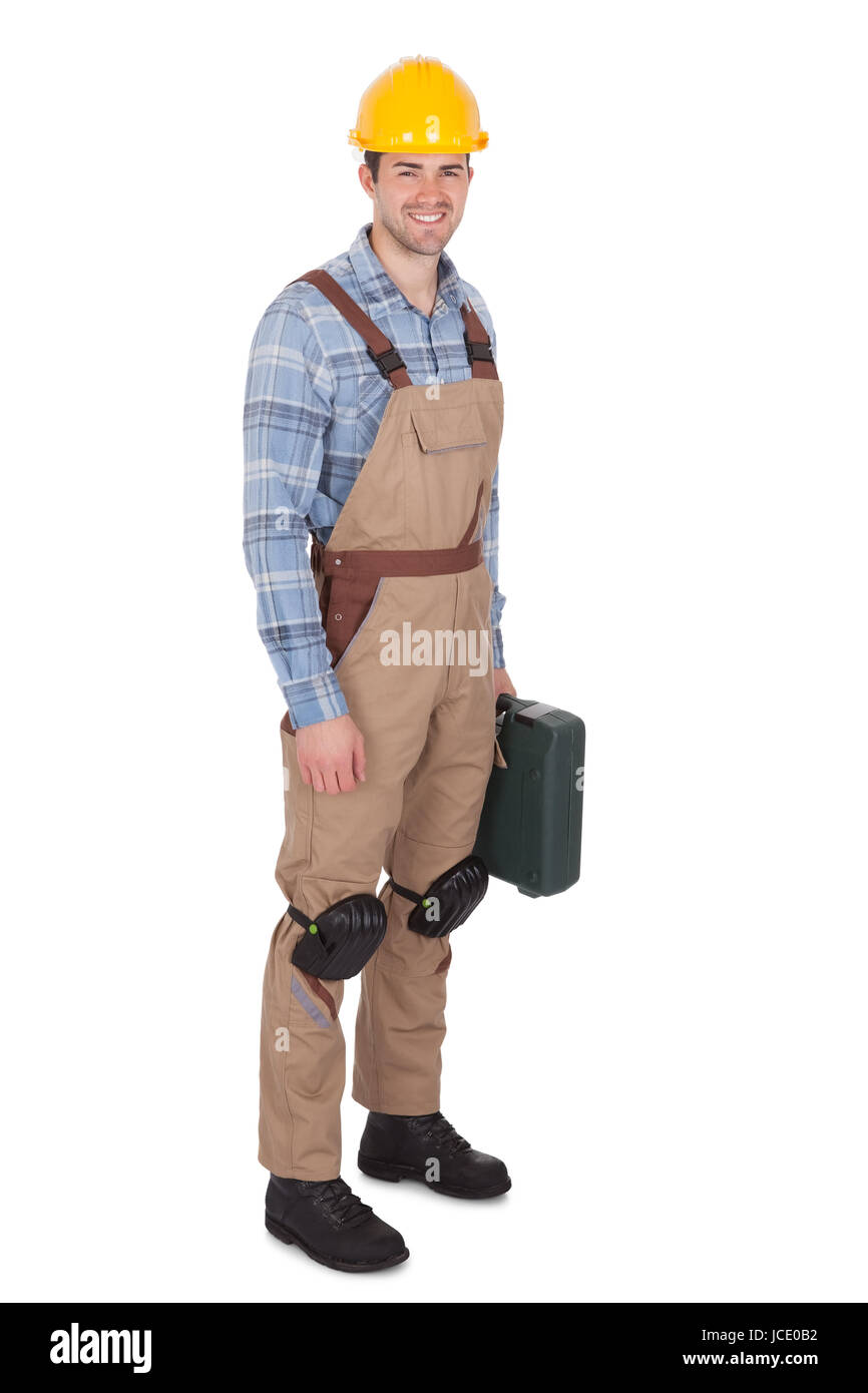 Worker wearing hard hat. Isolated on white Stock Photo - Alamy