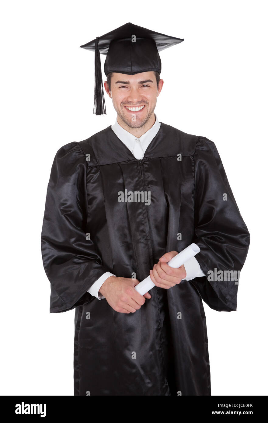 Cheerful young graduation man. Isolated on white Stock Photo - Alamy