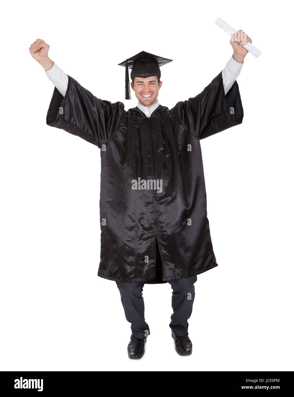 Cheerful young graduation man. Isolated on white Stock Photo - Alamy