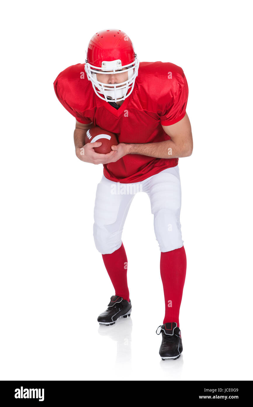 American Football player running with ball. Isolated on white Stock ...