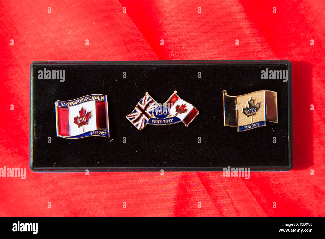 Pin badges commemorate the 150th anniversary of Canadian Confederation ...