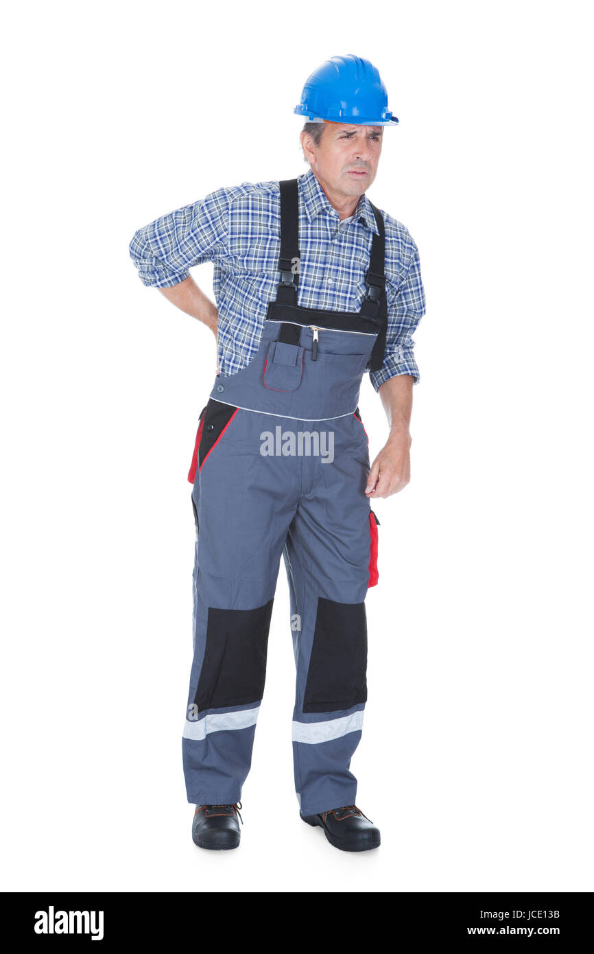 Portrait Of A Worker Having Back Pain Isolated Over White Background ...