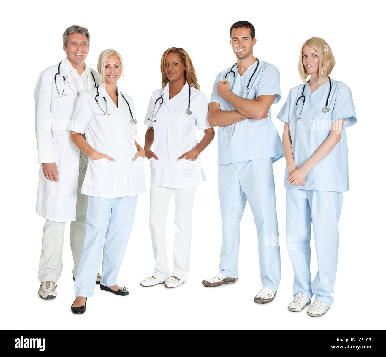 Group of doctors standing together isolated over white background Stock ...