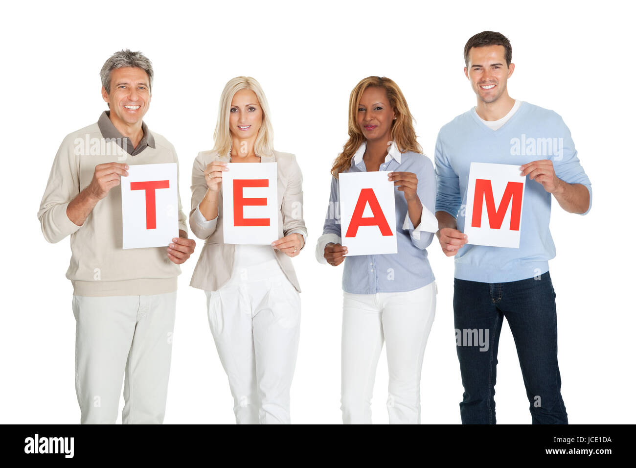 Happy group of people holding team sign board isolated on white ...
