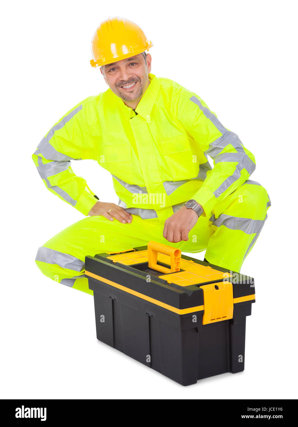 Portrait of worker wearing safety jacket and helmet. Isolated on white ...