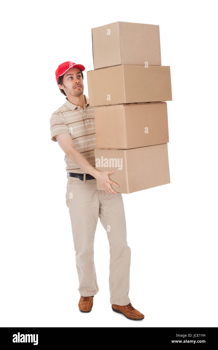 Delivery man carrying stack of boxes. Isolated on white Stock Photo - Alamy