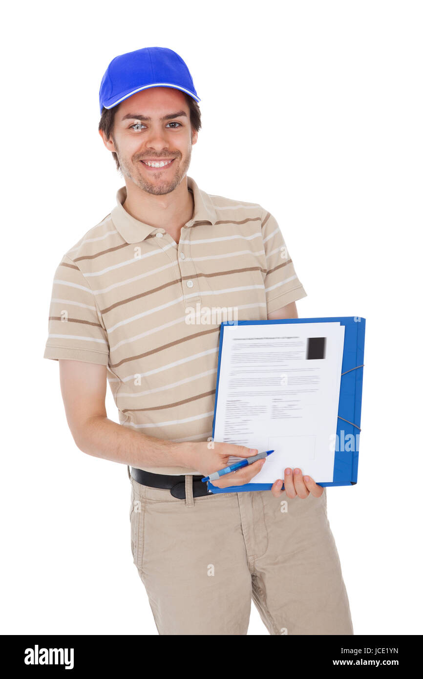 Delivery man asking to sign delivery confirmation. Isolated on white ...
