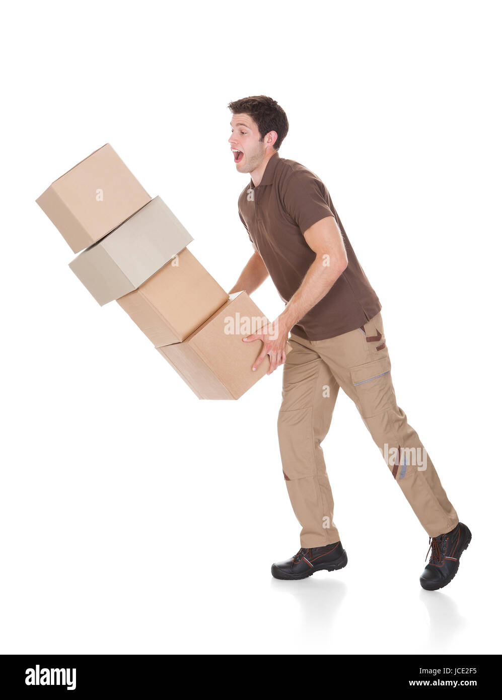 Delivery man falling stack boxes hi-res stock photography and images ...