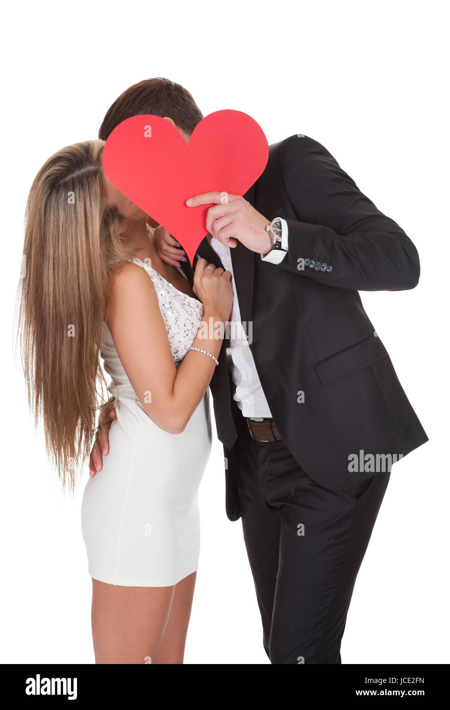 Lover showing affection for lady. Isolated on white Stock Photo - Alamy