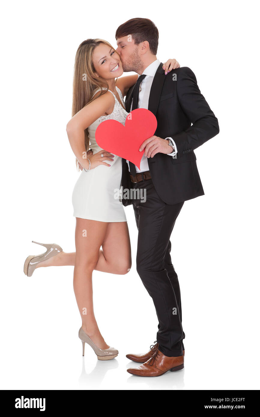 Lover showing affection for lady. Isolated on white Stock Photo - Alamy