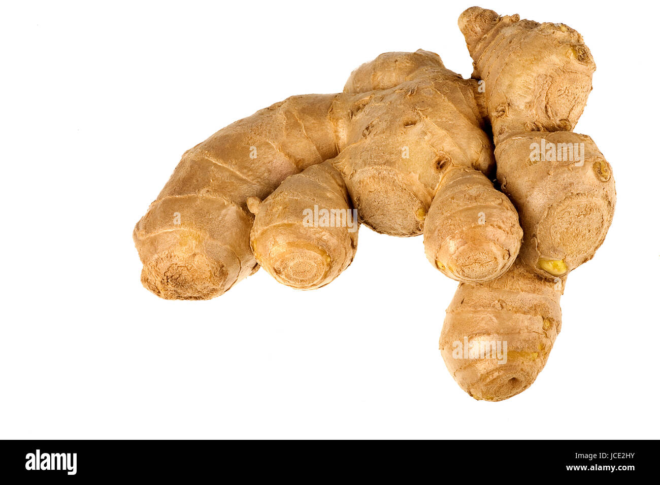 raw whole ginger root closeup isolated on white background Stock Photo ...