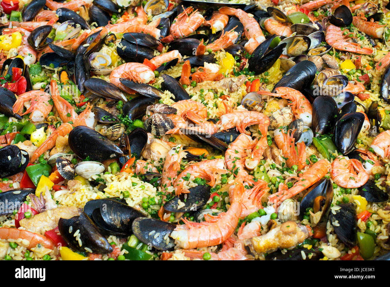 Paella with Shrimp and Clams close up background Stock Photo - Alamy