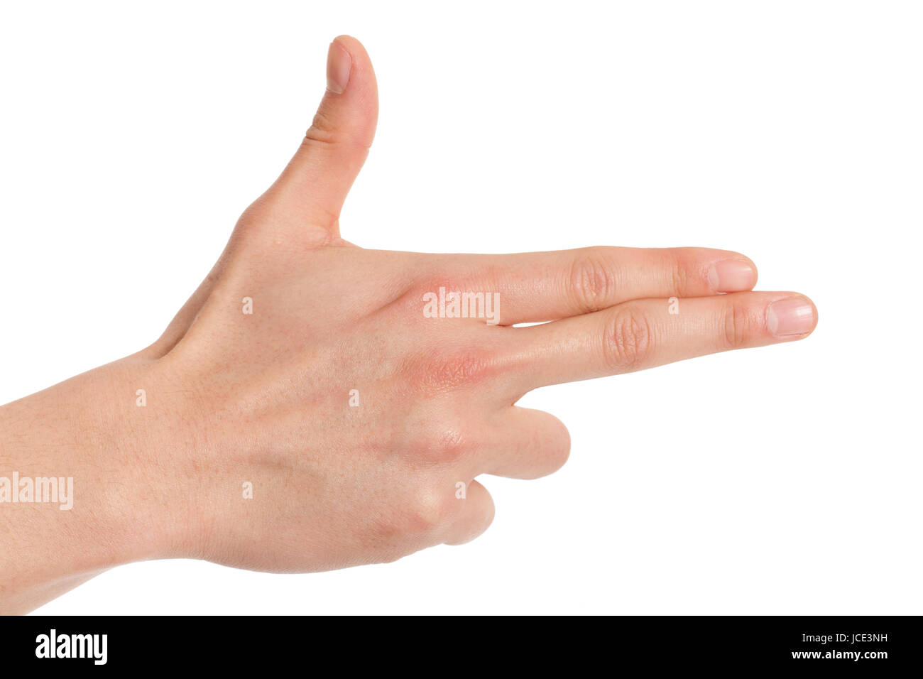 the hand of a young person mimicking a gun on white background Stock ...