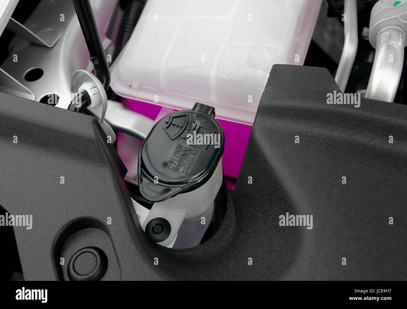 Windscreen wiper liquid container of a car Stock Photo - Alamy