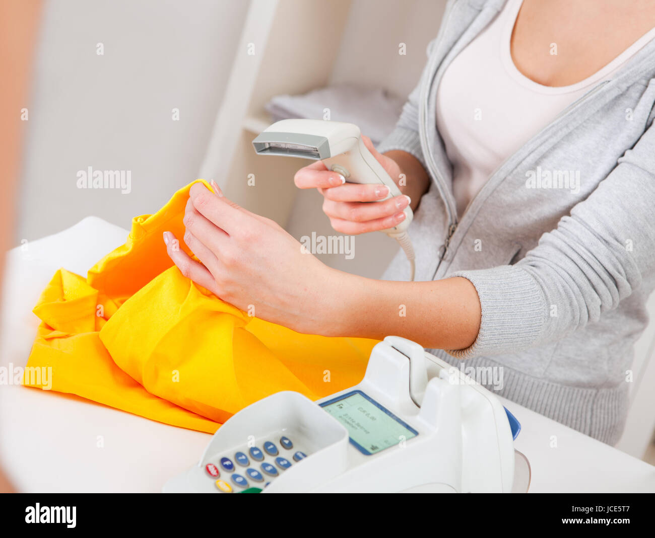 Portrait of beautiful sales person in the retail store Stock Photo - Alamy