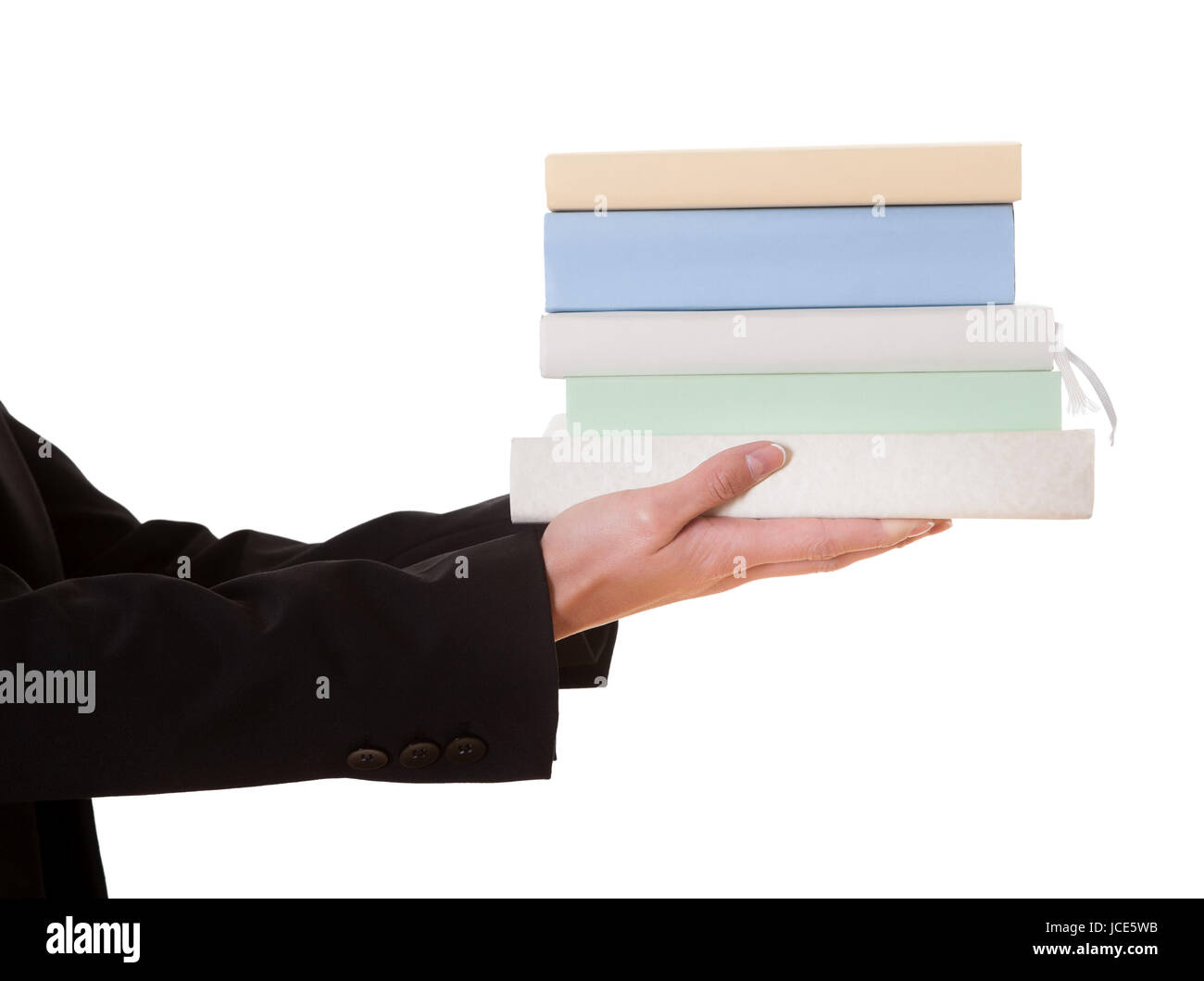 Woman holding stack of books. Isolated on white Stock Photo - Alamy