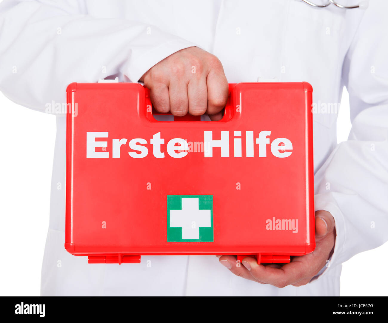 Doctor carrying a portable first aid kit on white background Stock ...