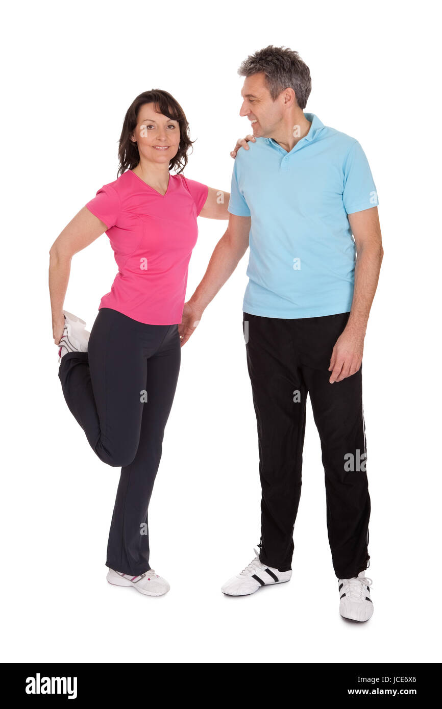 Mature couple stretching exercise Cut Out Stock Images & Pictures - Alamy