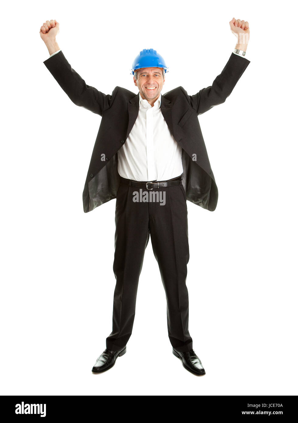 Full length portrait of successfull architect wearing blue hard hat ...